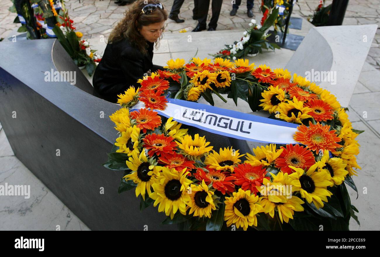 Dalia Rabin lays flowers on the grave of her father, the late Israeli ...