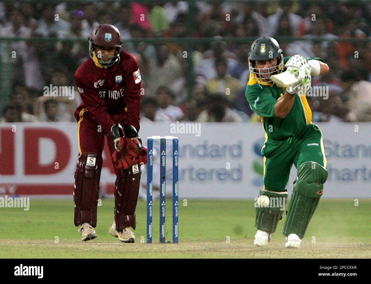 South African batsman Herschelle Gibbs drives the ball in the second ...