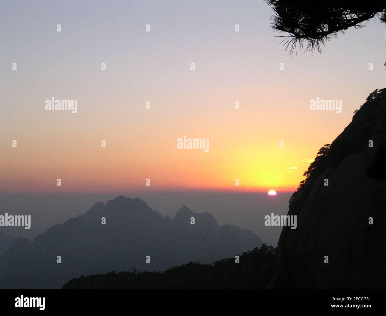 A sunset is seen over Huangshan, or Yellow Mountain, in this October ...