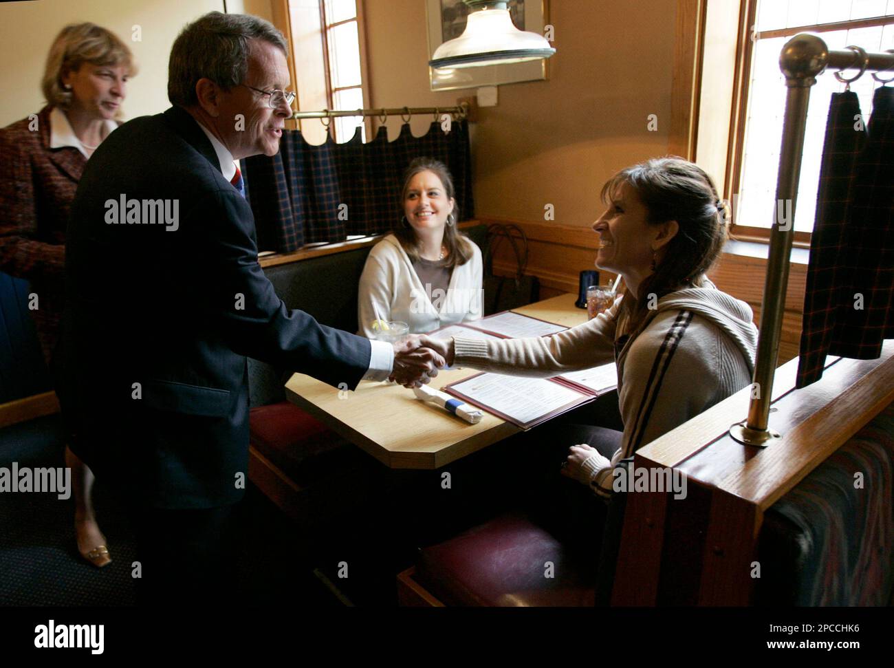 Sen. Mike DeWine, R-Ohio, center left, and his wife, Fran, greet Julie ...