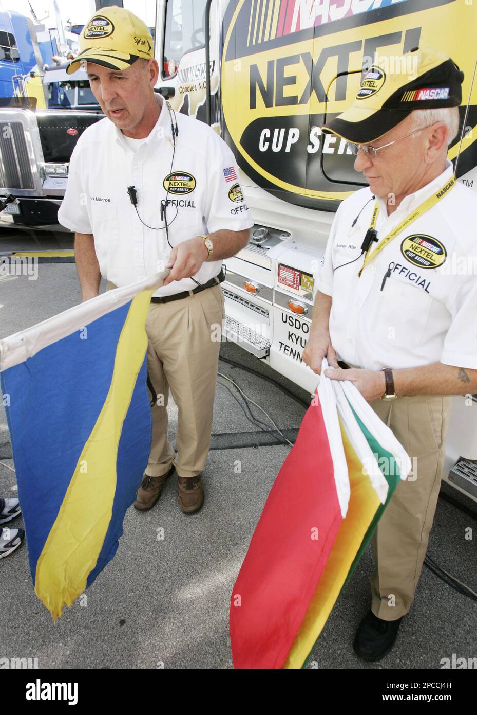 NASCAR officials Rick Monroe, left, and Rodney Wise show the eight ...