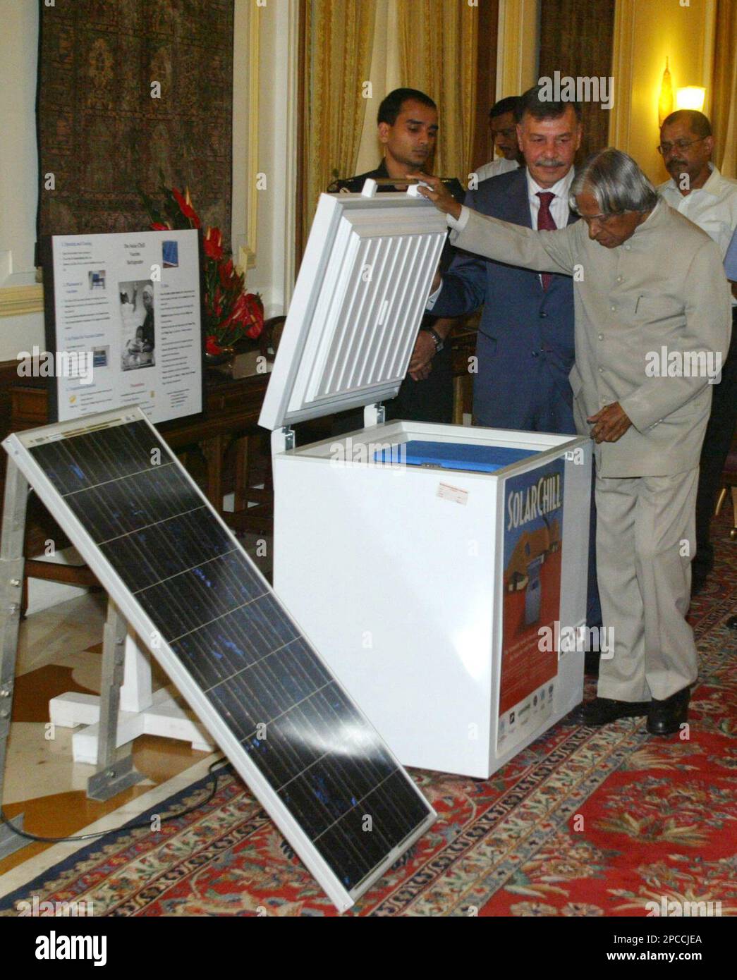 Indian President A P J Abdul Kalam, right, looks inside Solar Chill, an ...