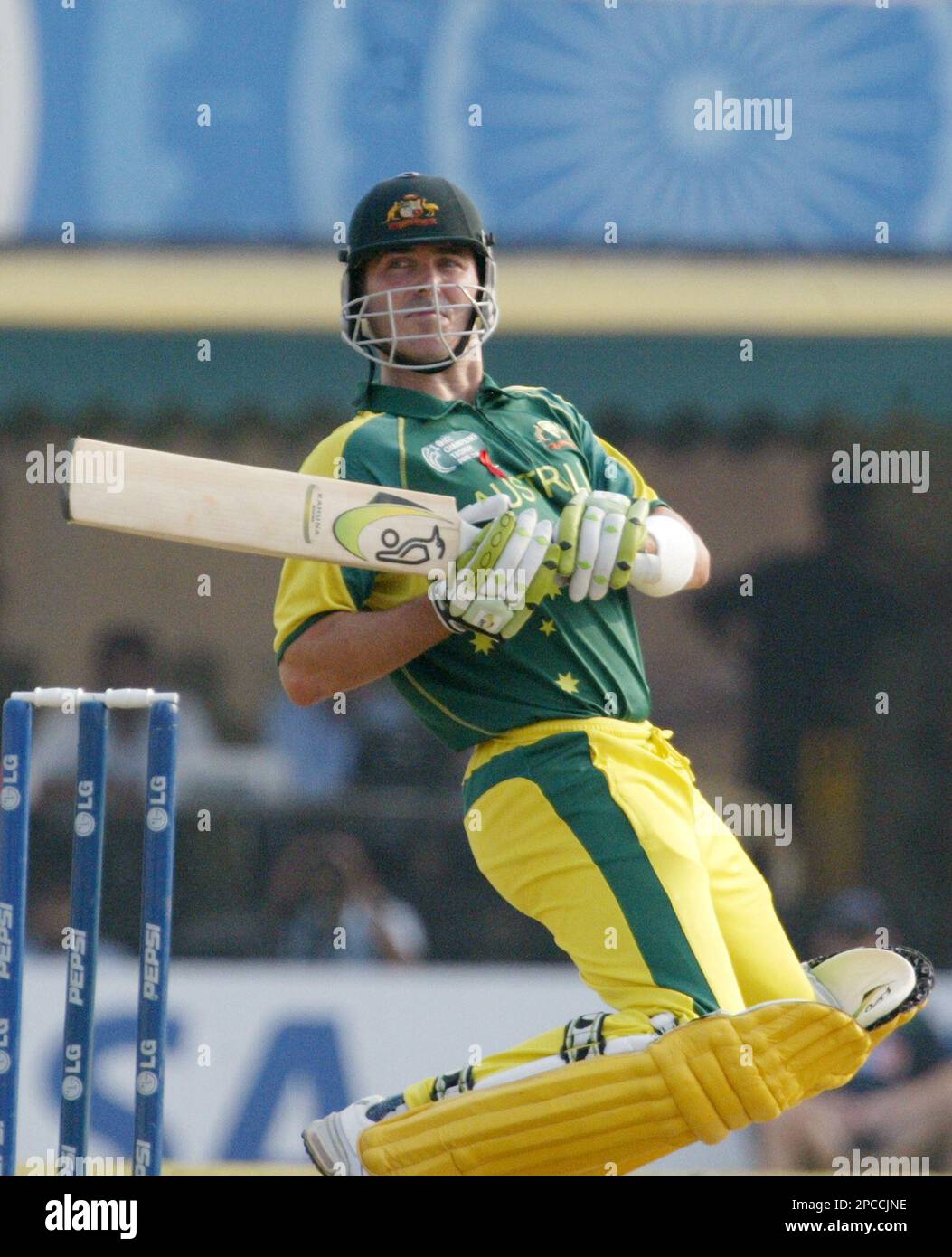 Australia's Damien Martyn ducks for a ball off New Zealand's Shane Bond ...