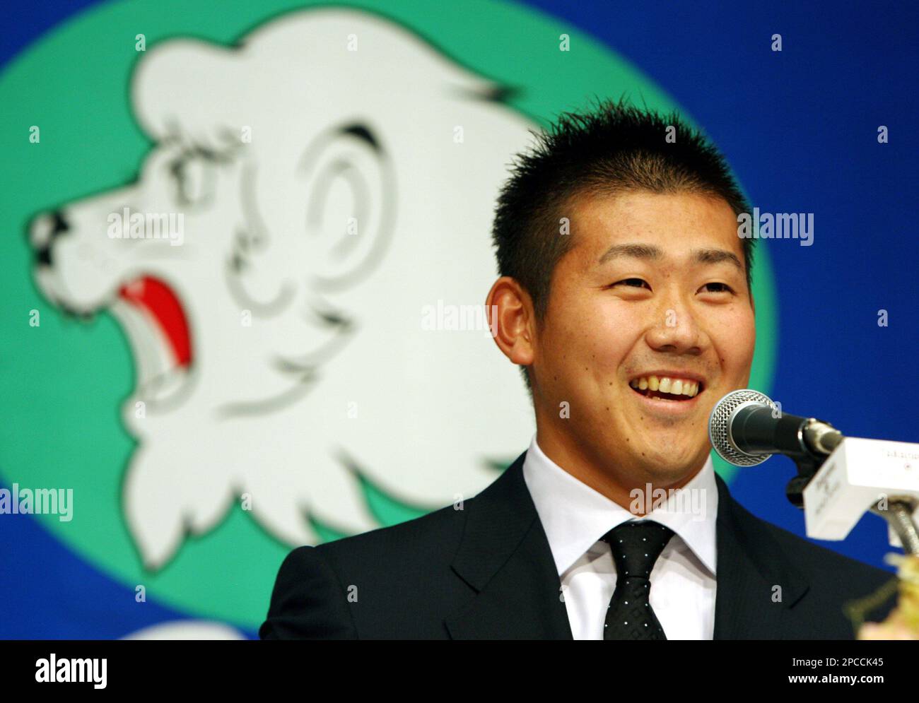 Japanese star pitcher Daisuke Matsuzaka of Seibu Lions speaks in front ...