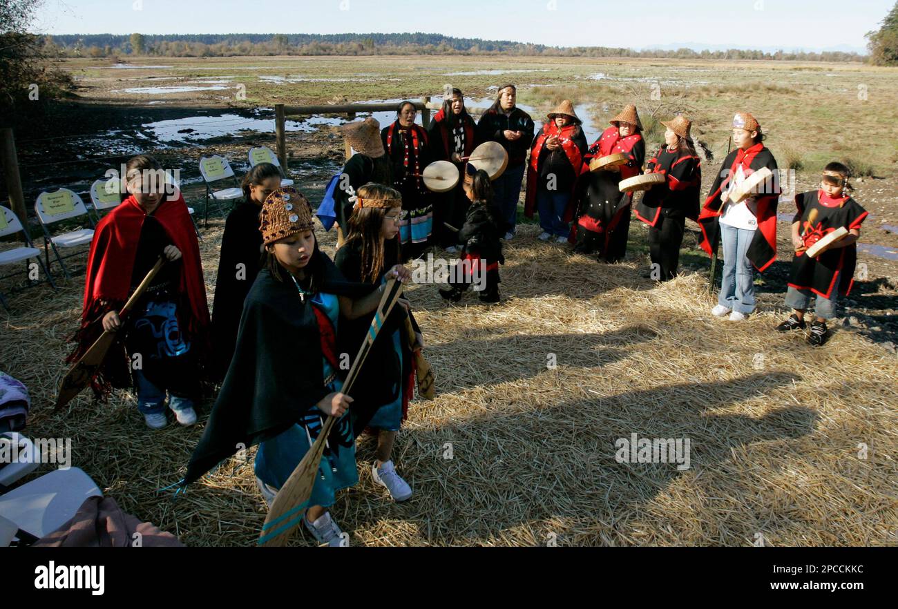 Sommer Sanchez, 14, right center, and Chay Squally, 14, left center ...