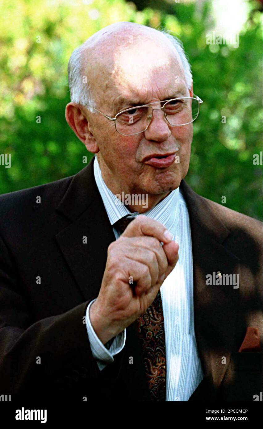 Former South African President P.W. Botha talks to reporters in front ...