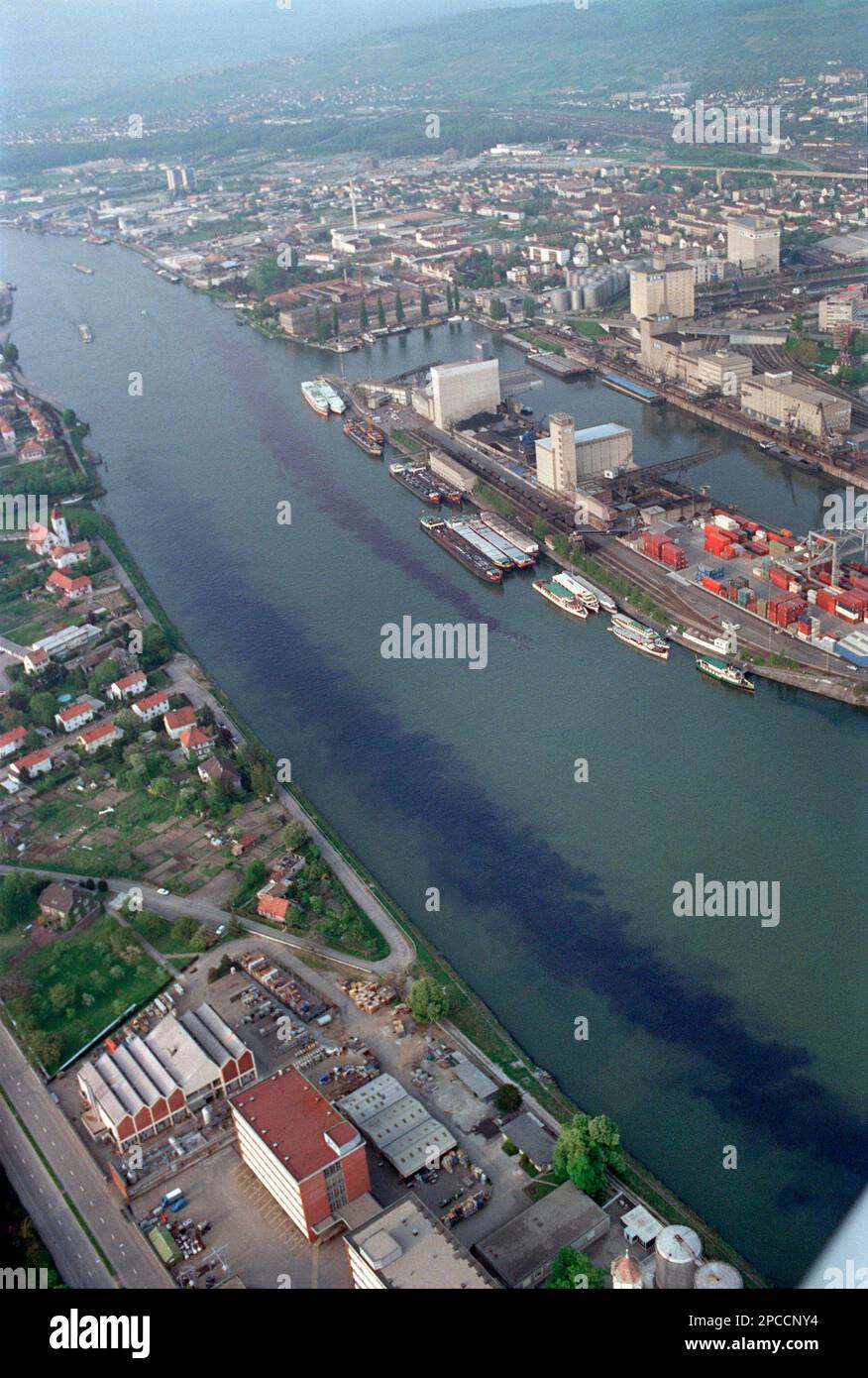 ** FILE ** The water of the river Rhine shows different colours in this ...