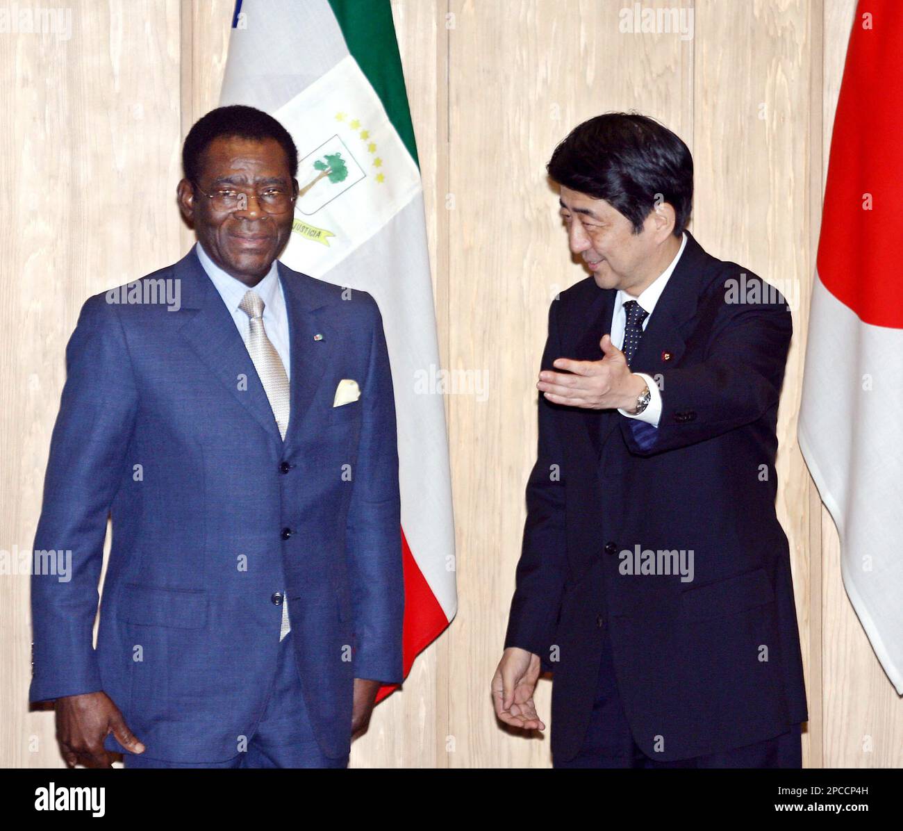 President of Equatorial Guinea Obiang Nguema Mbasogo, left, is greeted ...