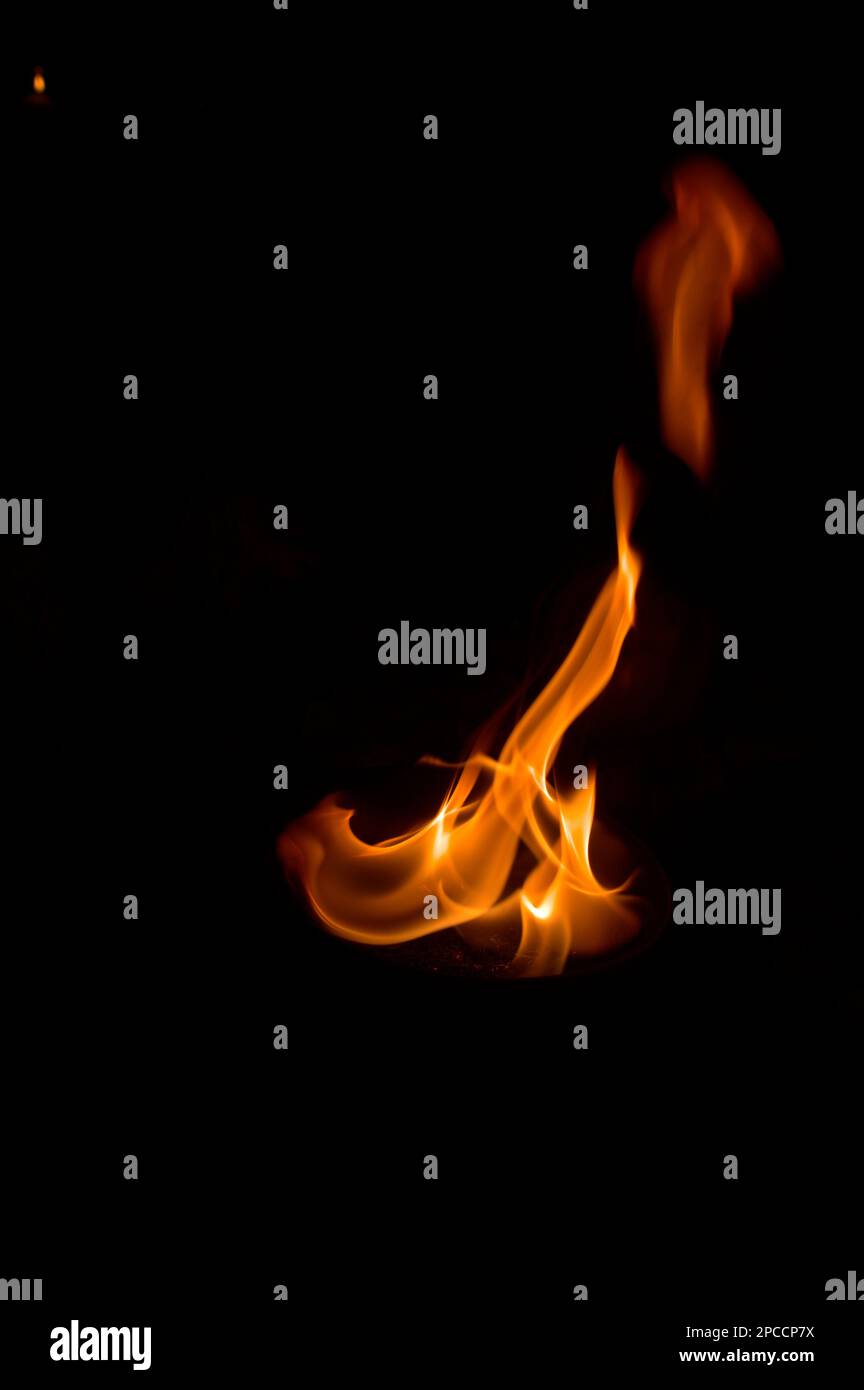 Fire in darkness Stock Photo - Alamy