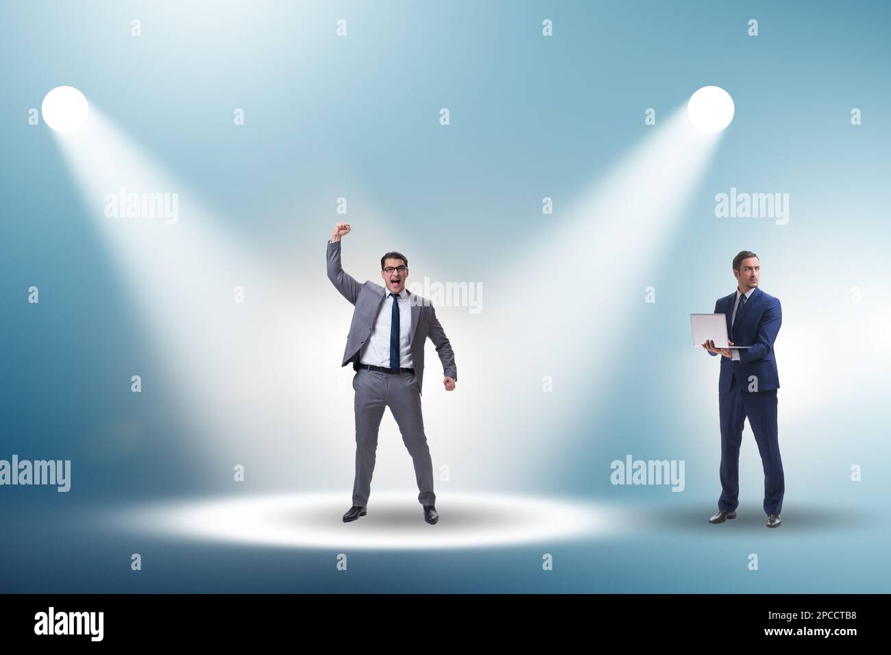 Business people under the spotlight concept Stock Photo - Alamy