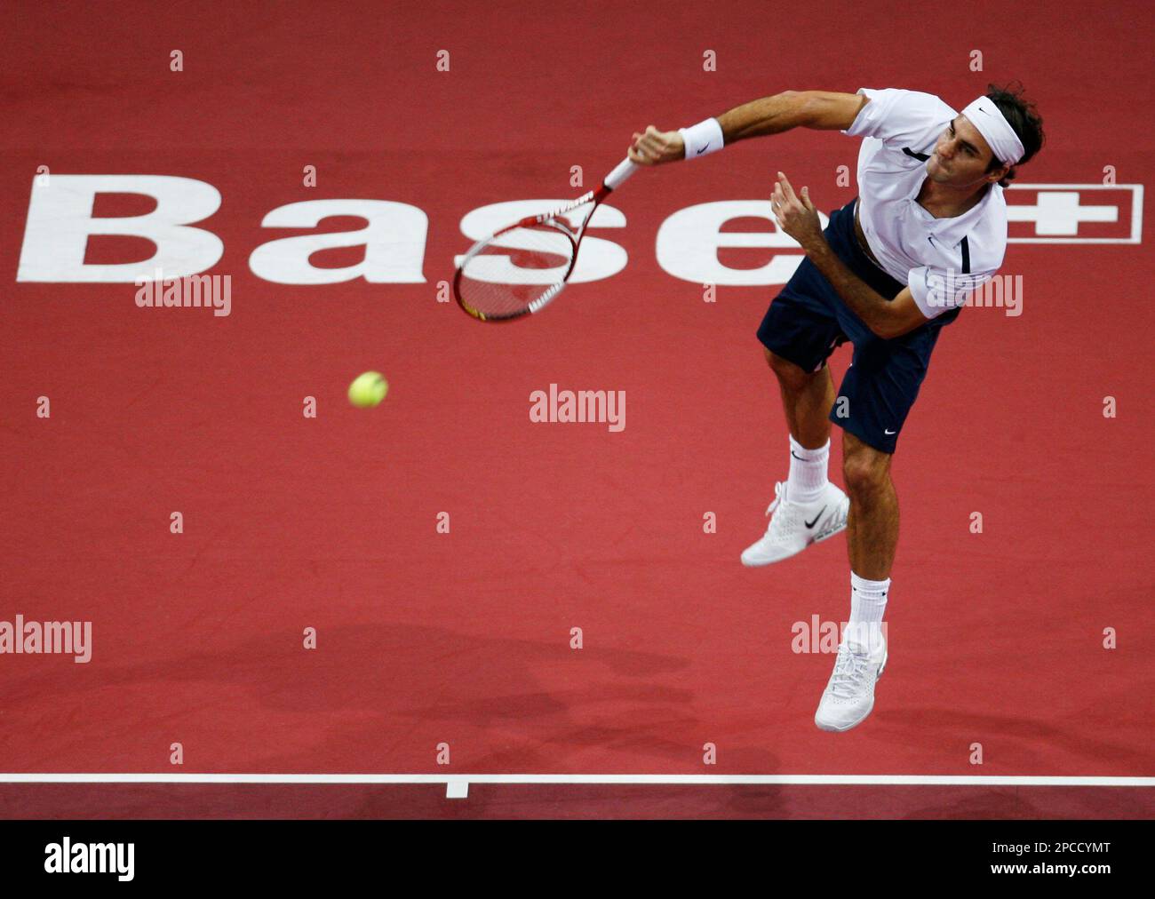 Switzerland's Roger Federer serves the ball to Chile's Fernando ...