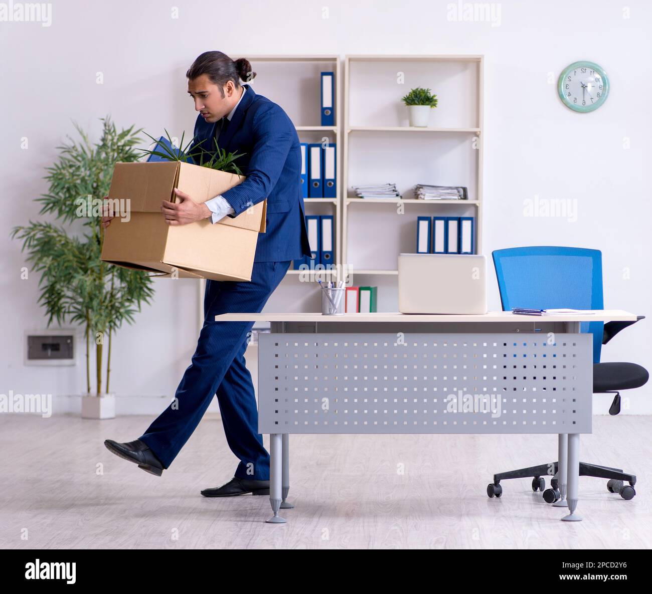 The young employee being made redundant Stock Photo - Alamy