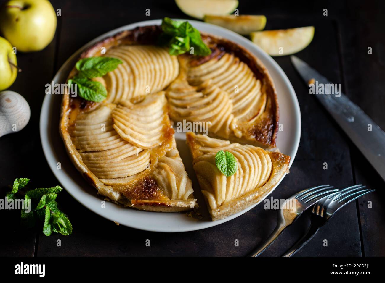 Apple french pie: temptation on black background. Traditional open pie ...