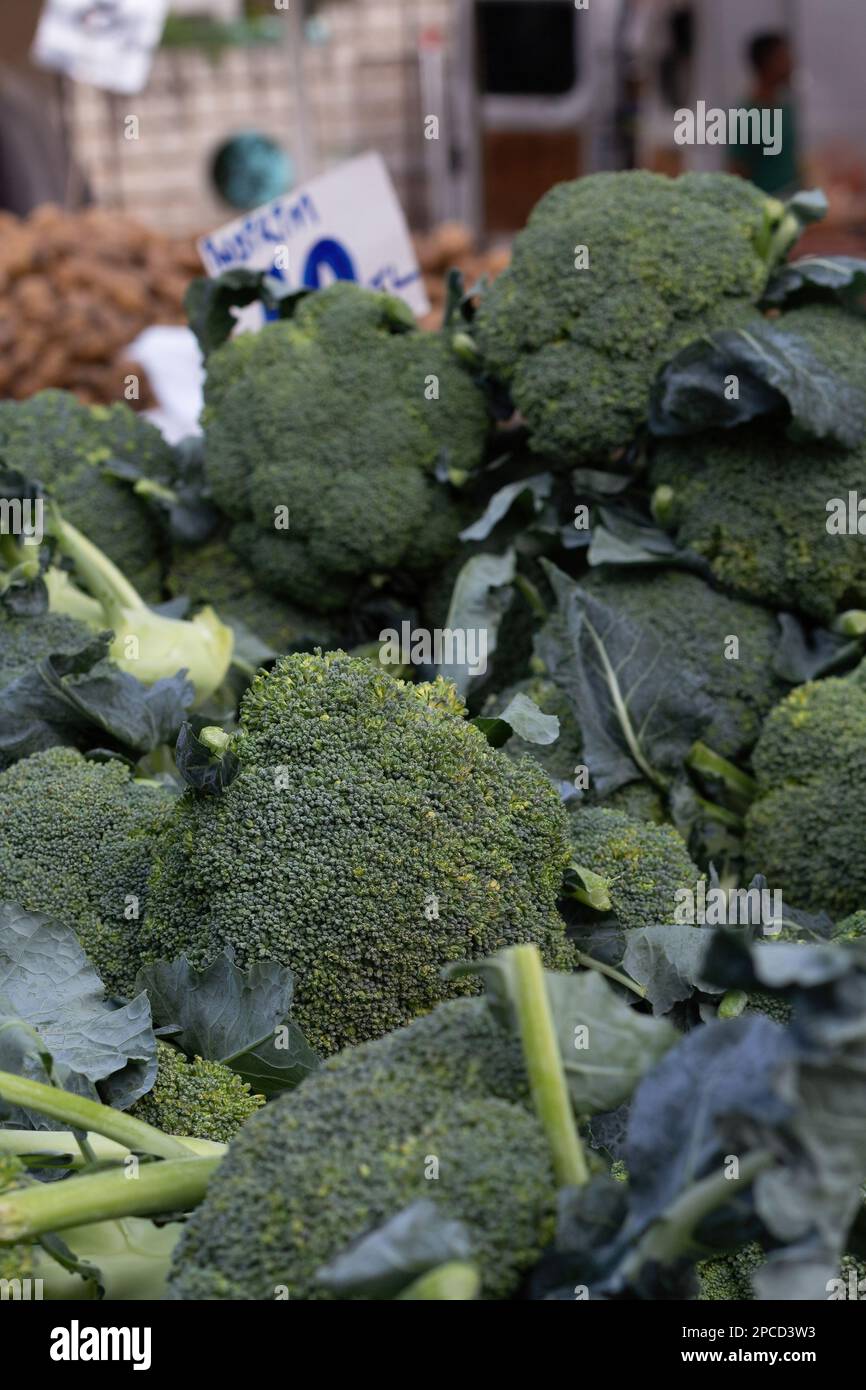 A bunch of broccoli is on display in a market Stock Photo - Alamy