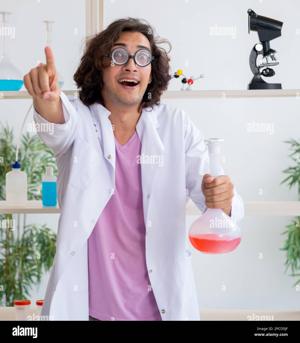 Funny male chemist working in the lab hi-res stock photography and ...