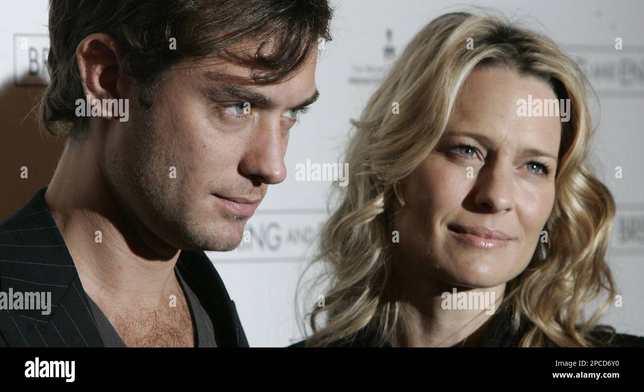 British actor Jude Law, left, and U.S. actress Robin Wright Penn at a ...