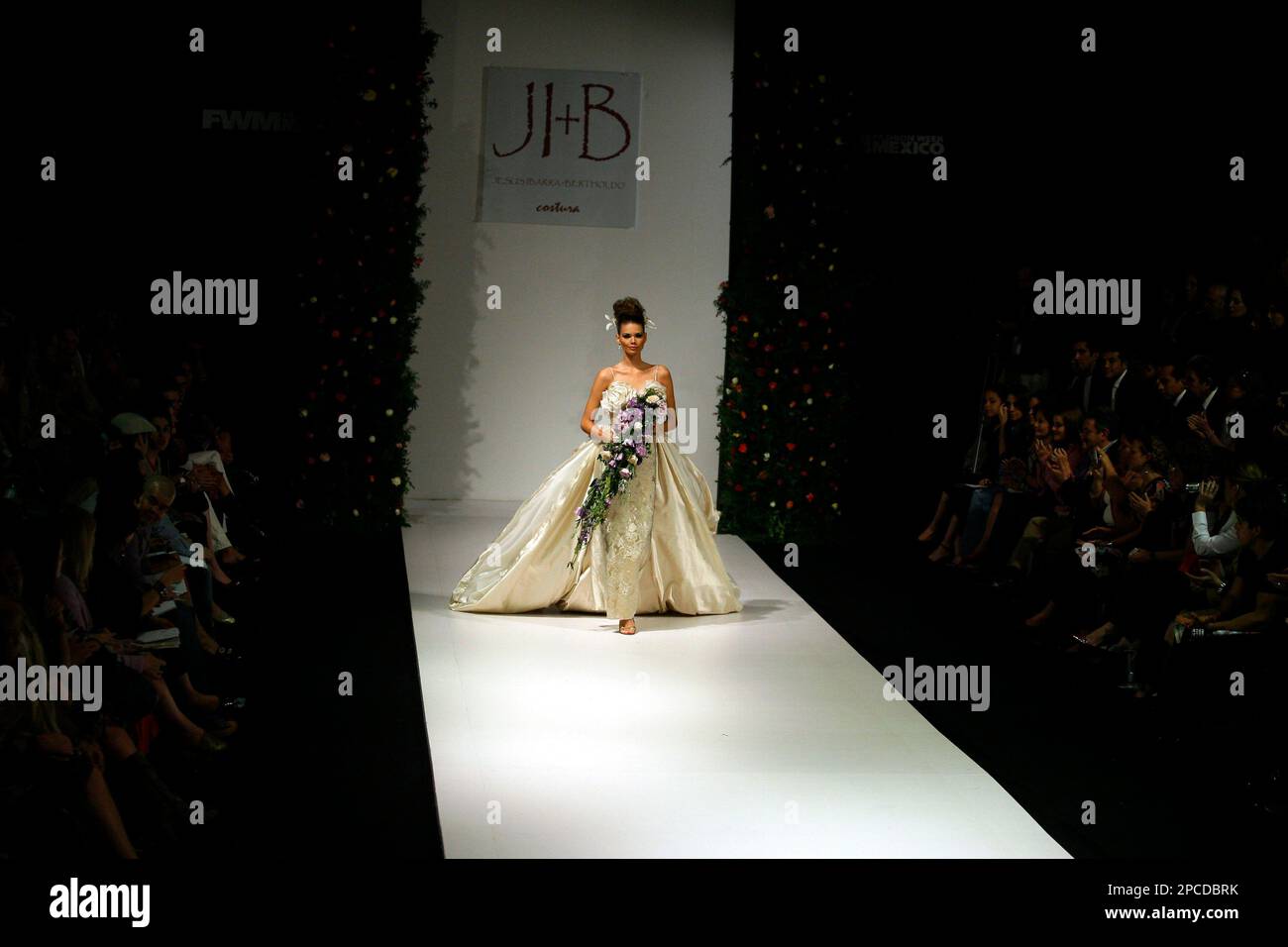 Models walk the runway showing creations from the collection of Jesus ...