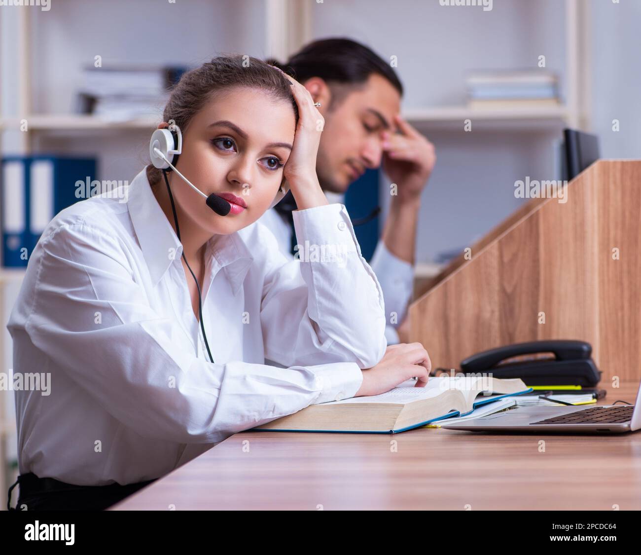 The call center operators working in the office Stock Photo - Alamy