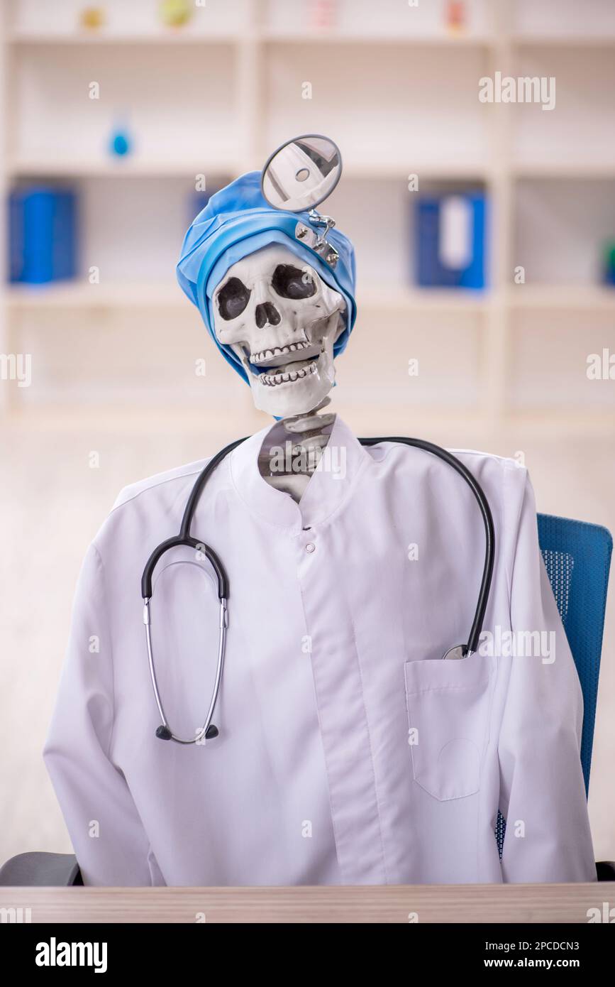 Funny devil doctor working at the hospital Stock Photo - Alamy