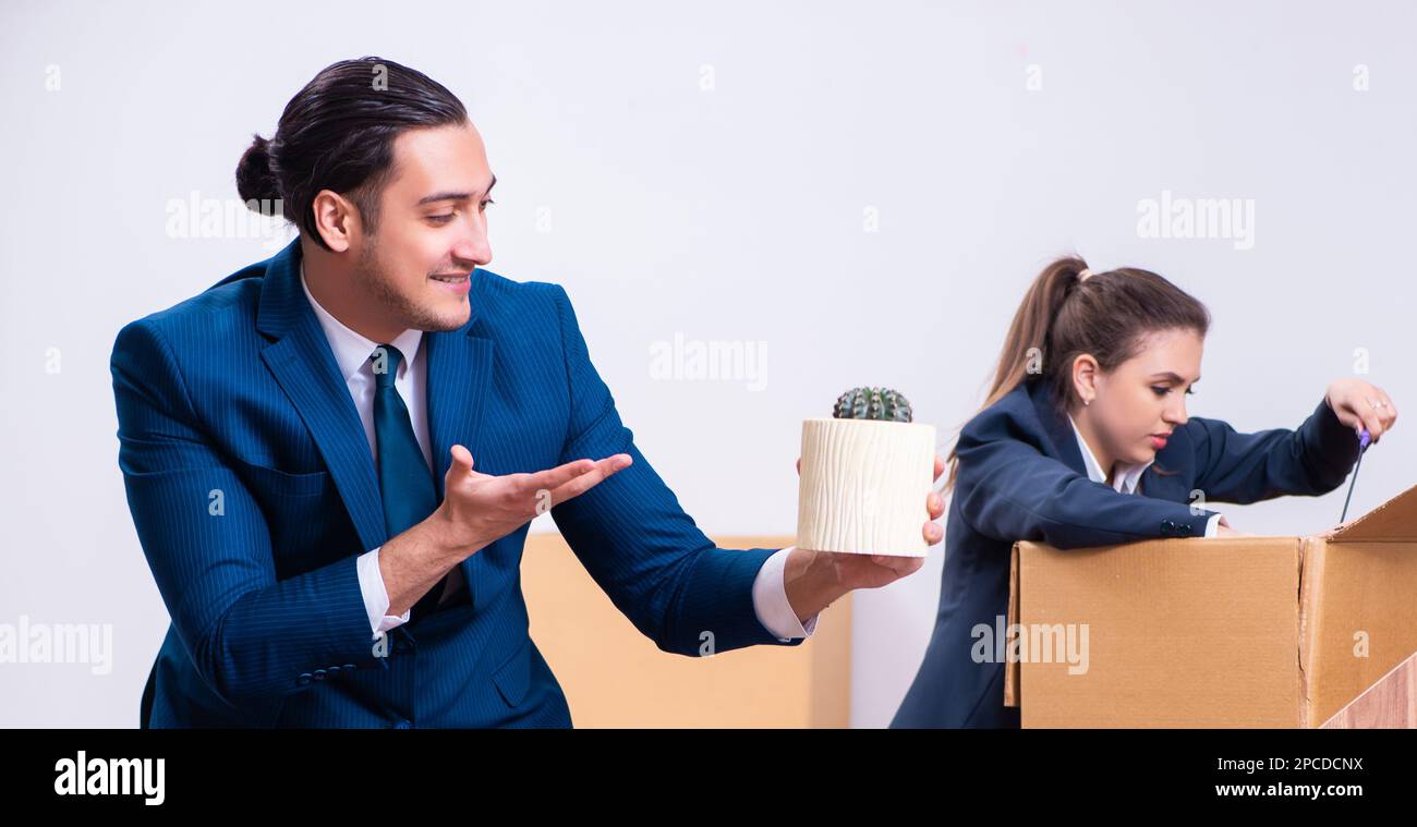 The two employees being fired from their work Stock Photo - Alamy
