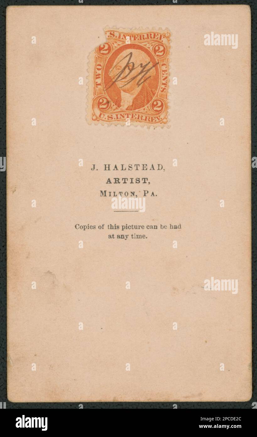 Unidentified soldier in Union uniform holding photograph album and his ...