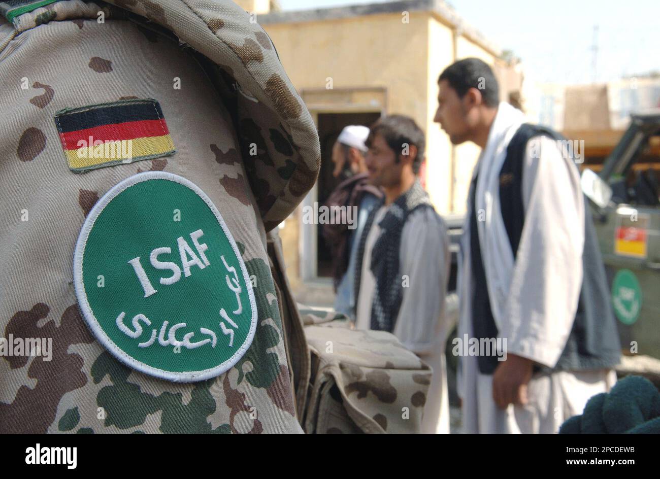 ** FILE ** A German ISAF soldier stands inside the PRT (Provincial ...