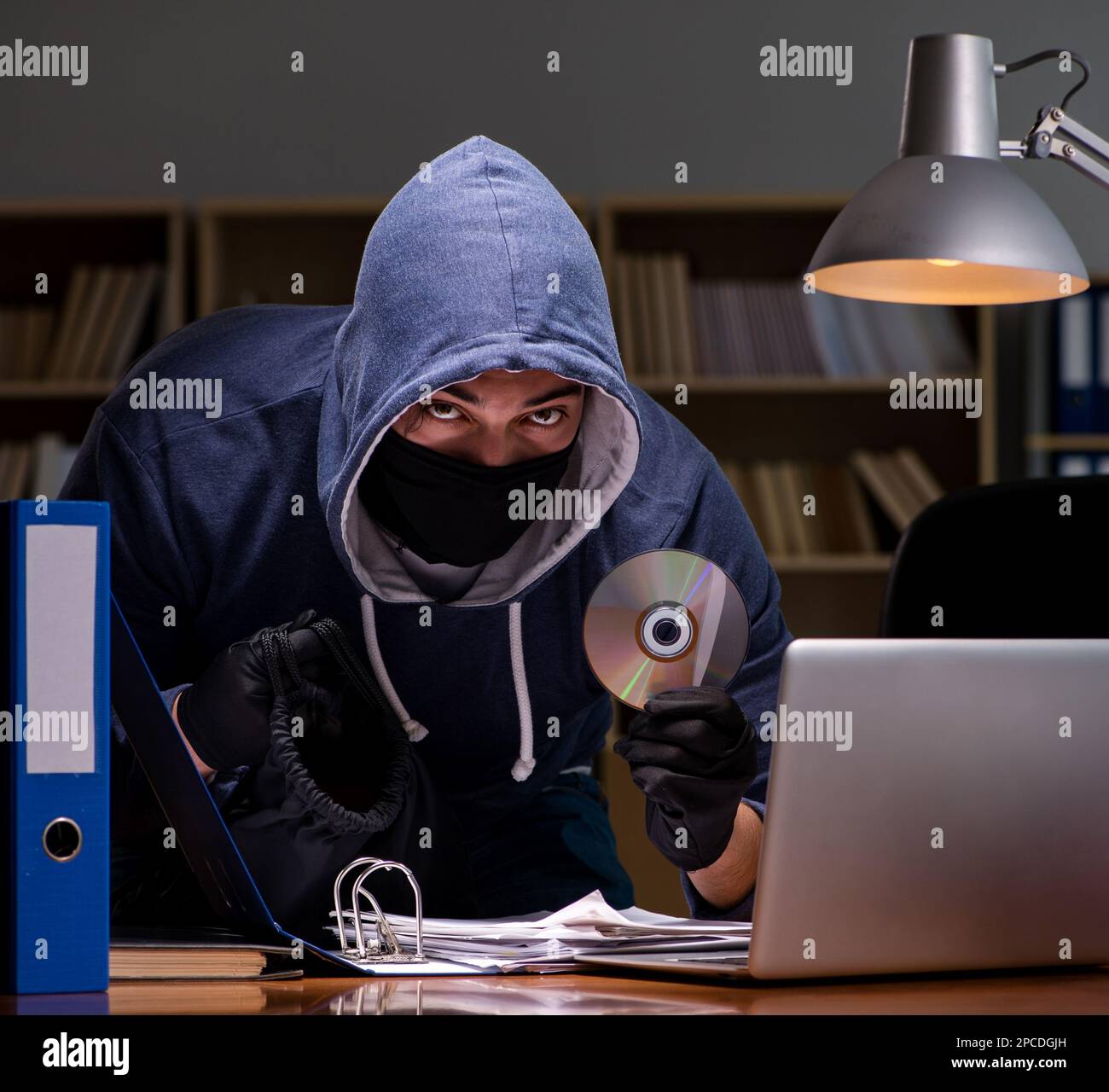 The hacker stealing personal data from home computer Stock Photo - Alamy