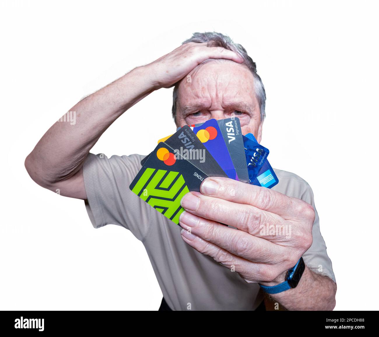 Morgantown, WV - 13 March 2023: Senior adult man holding stack of ...