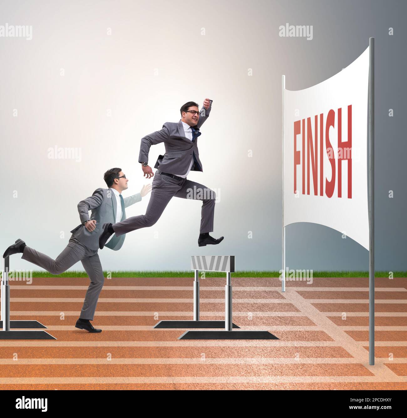 The businessman jumping over barriers in business concept Stock Photo ...