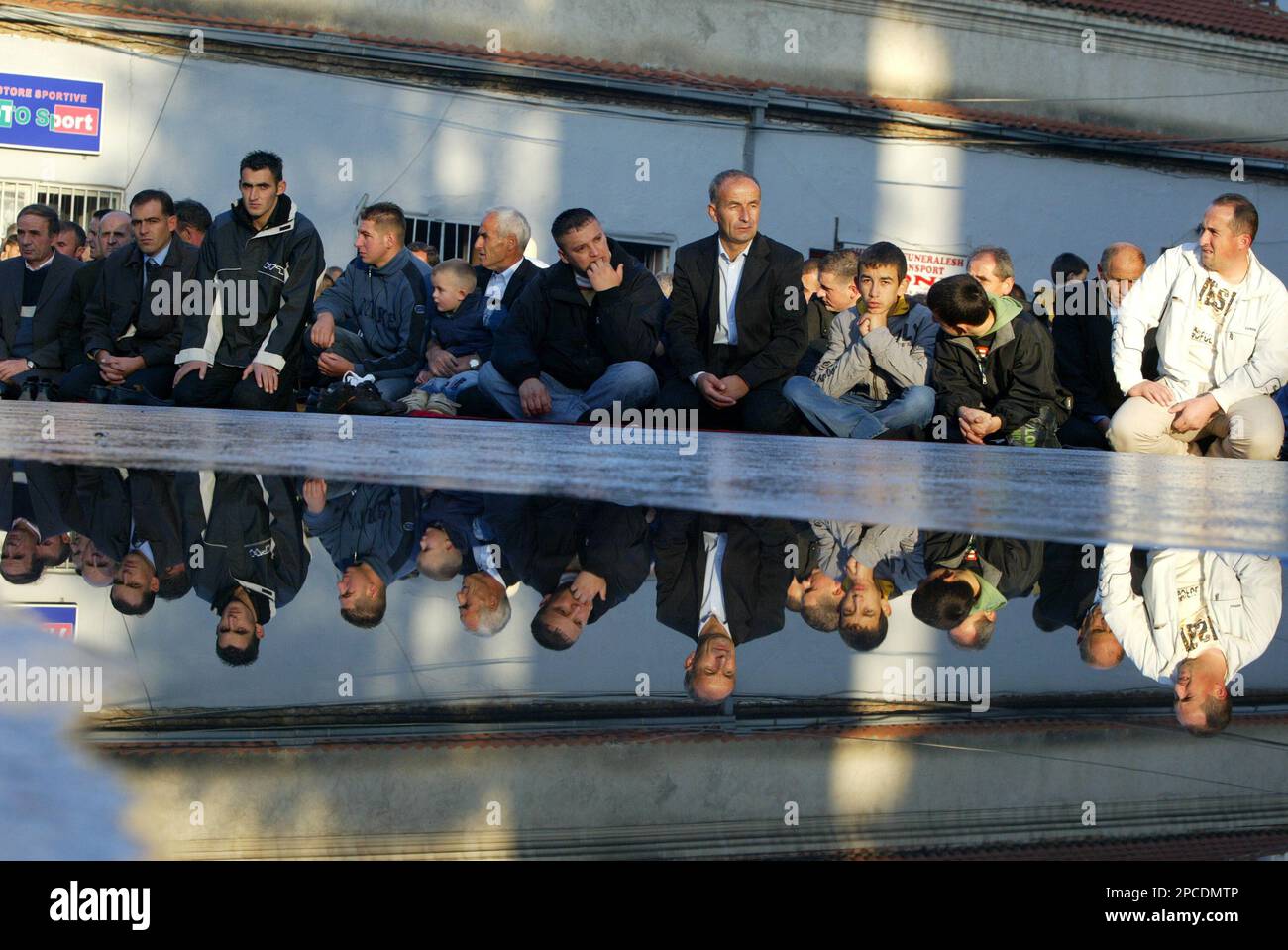 Kosovo muslims are lined up in the streets of capital Pristina on ...