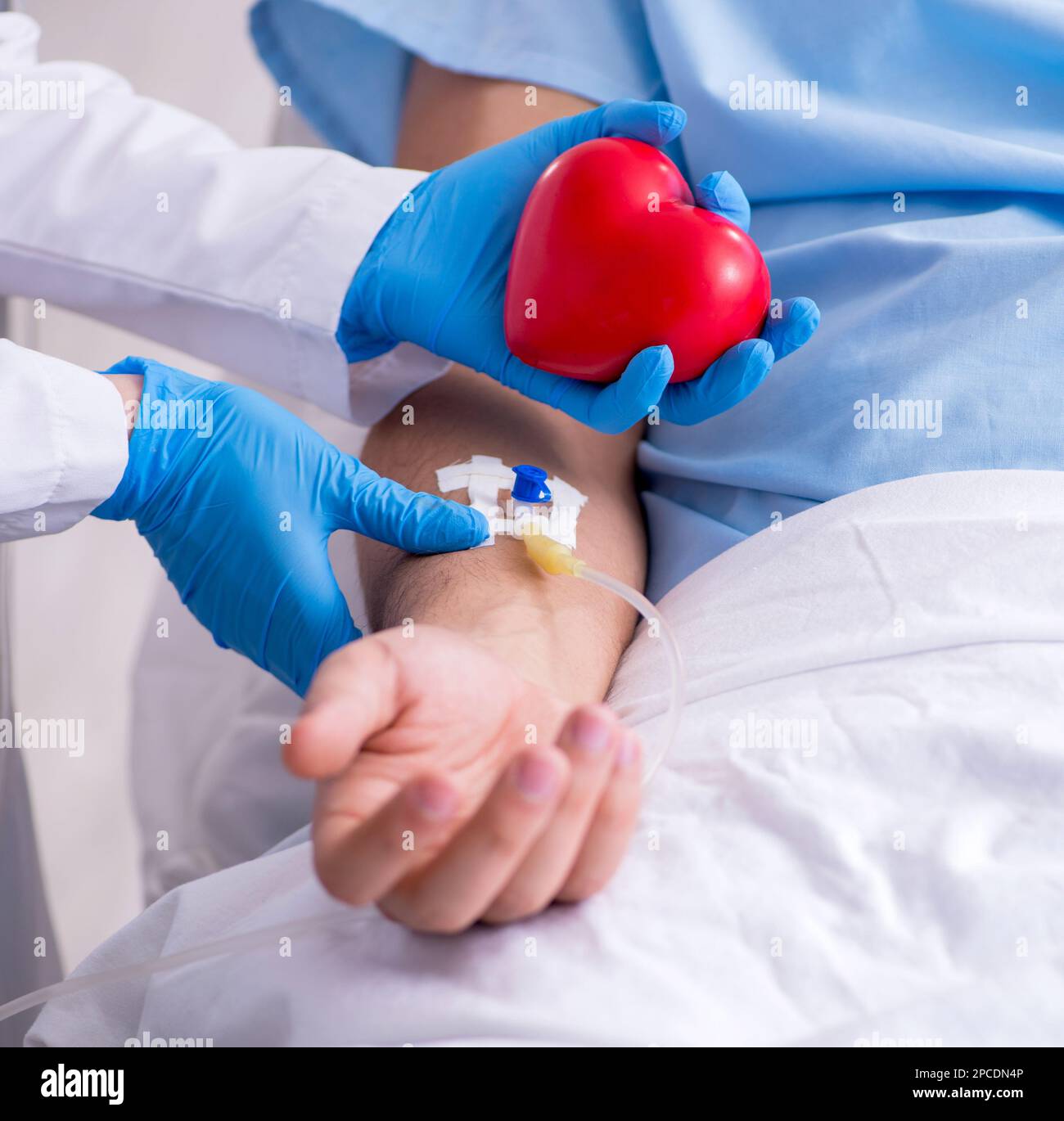 The male patient getting blood transfusion in hospital clinic Stock ...
