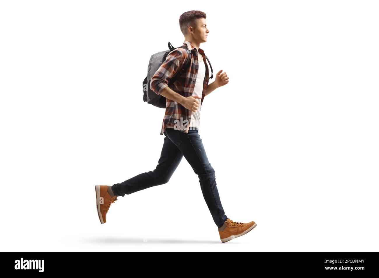 Full length profile shot of a male student running isolated on white ...
