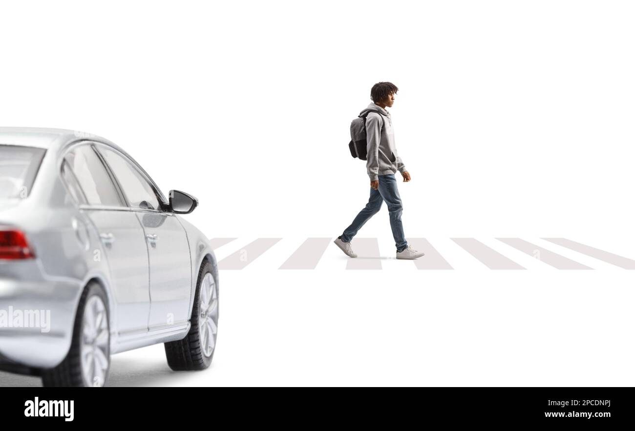 Car waiting for a pedestrian to cross a street isolated on white ...