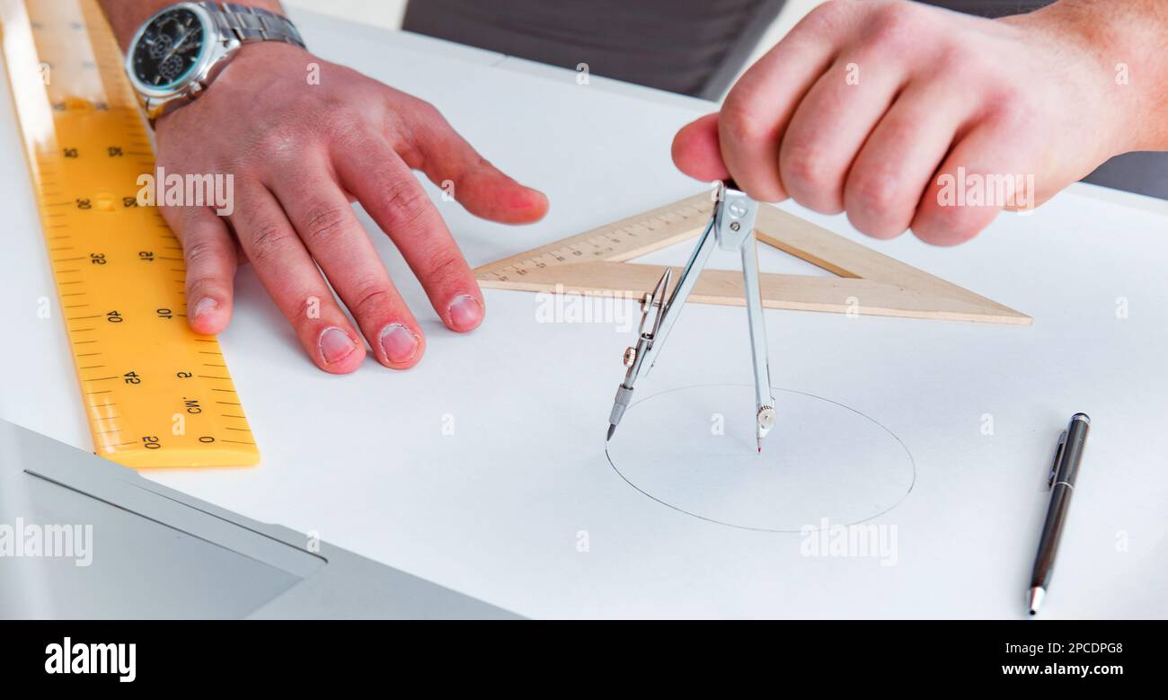 The male engineer working on drawings and blueprints Stock Photo - Alamy