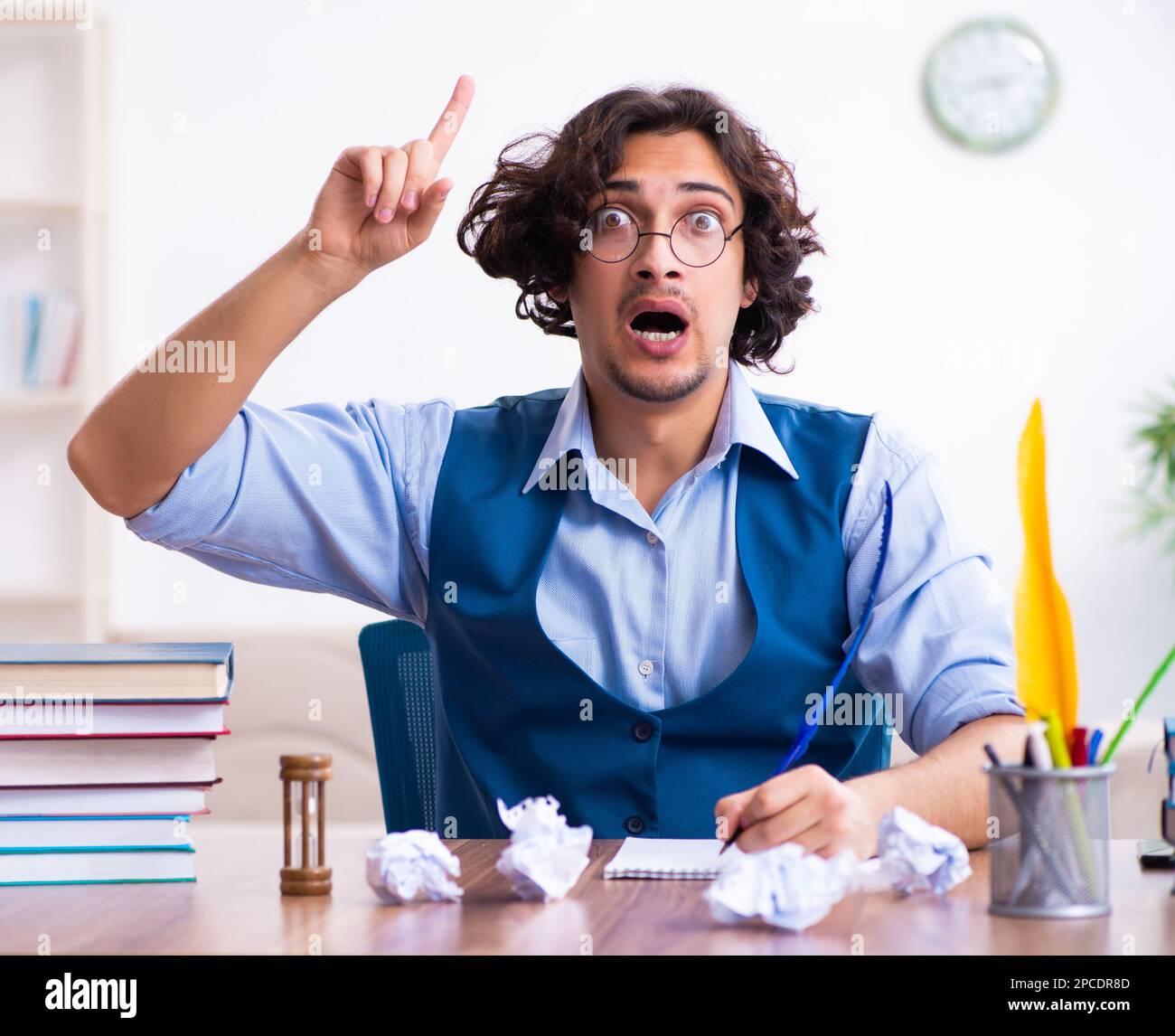 The young writer working on his new work Stock Photo - Alamy