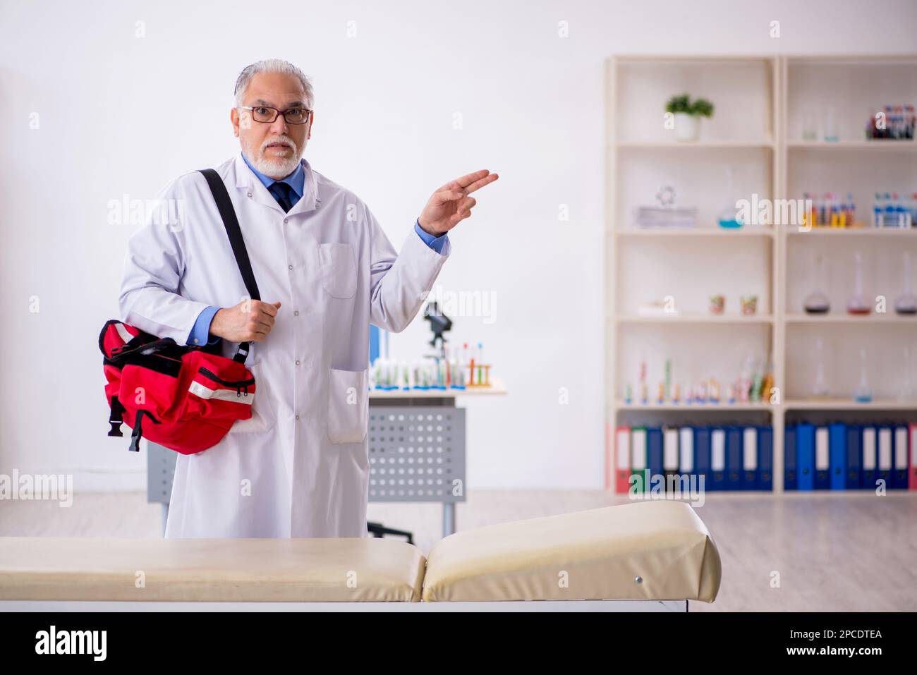 Aged male paramedic working hi-res stock photography and images - Alamy