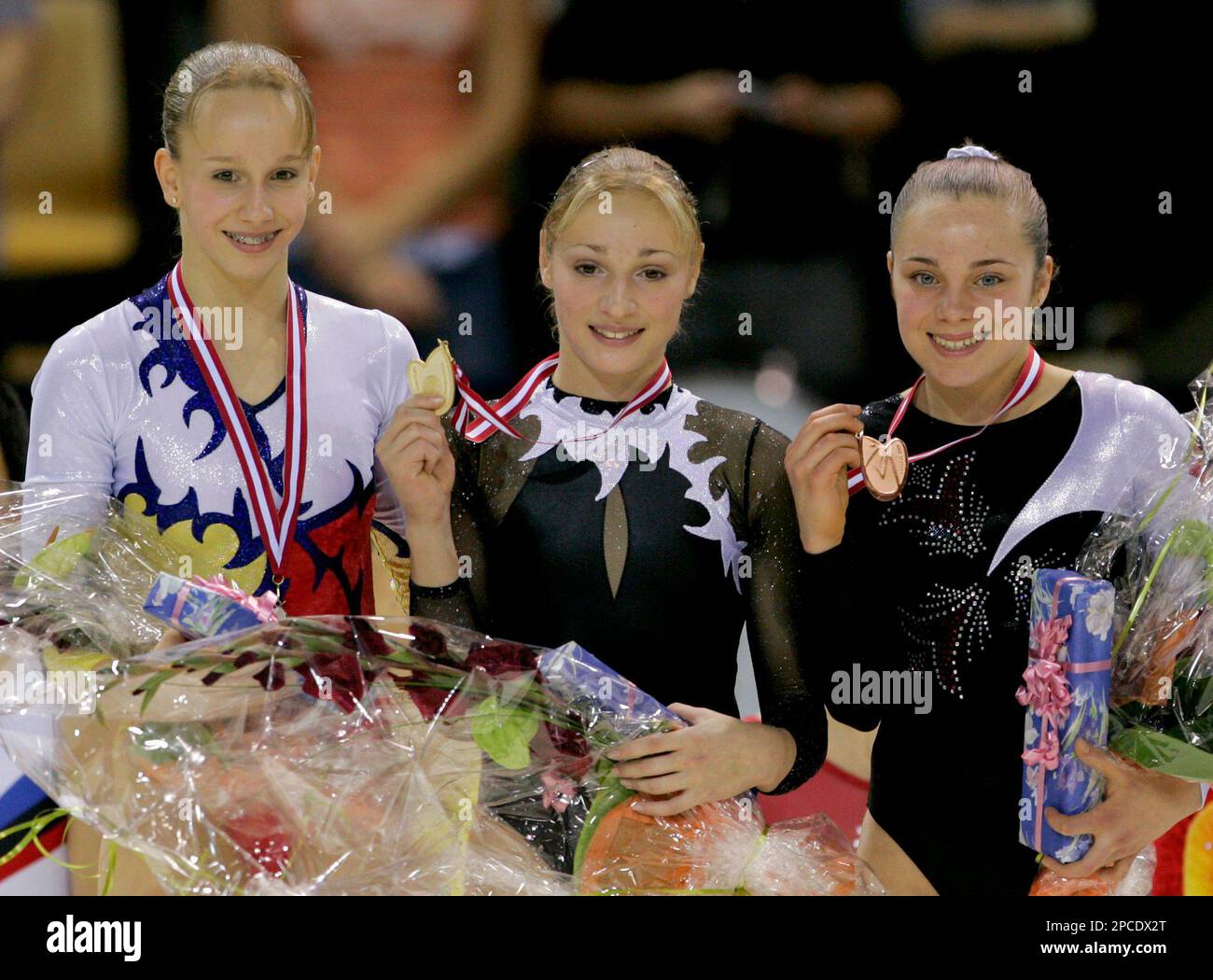 Silver medalist Romania's Sandra Raluka Izbasa, left, gold medalist ...