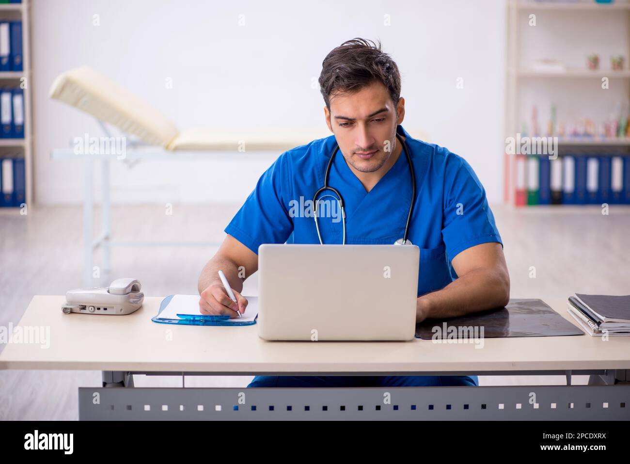 Doctor taking notes telehealth hi-res stock photography and images - Alamy