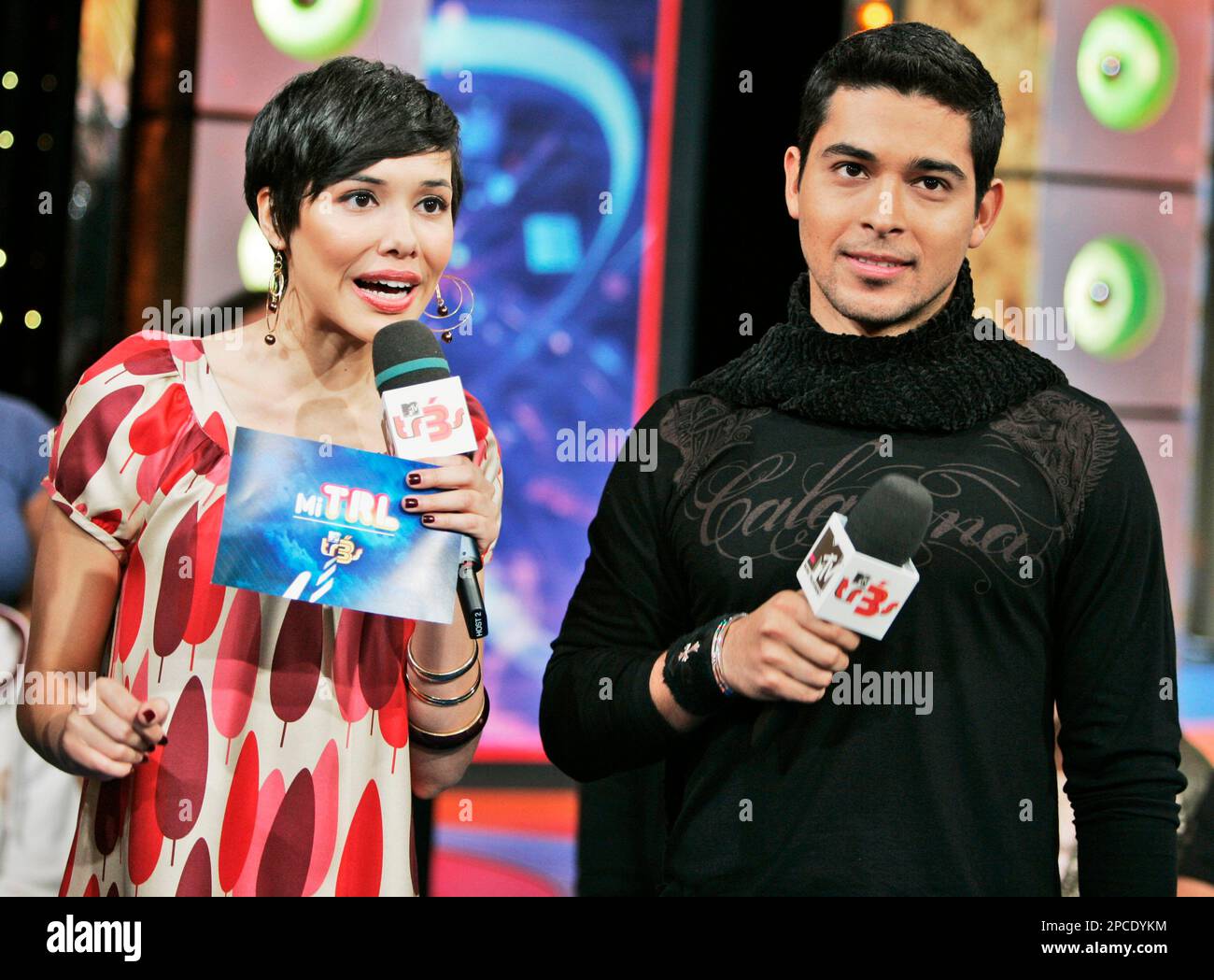 Actor Wilmer Valderrama, right, appears on stage with host Denise ...