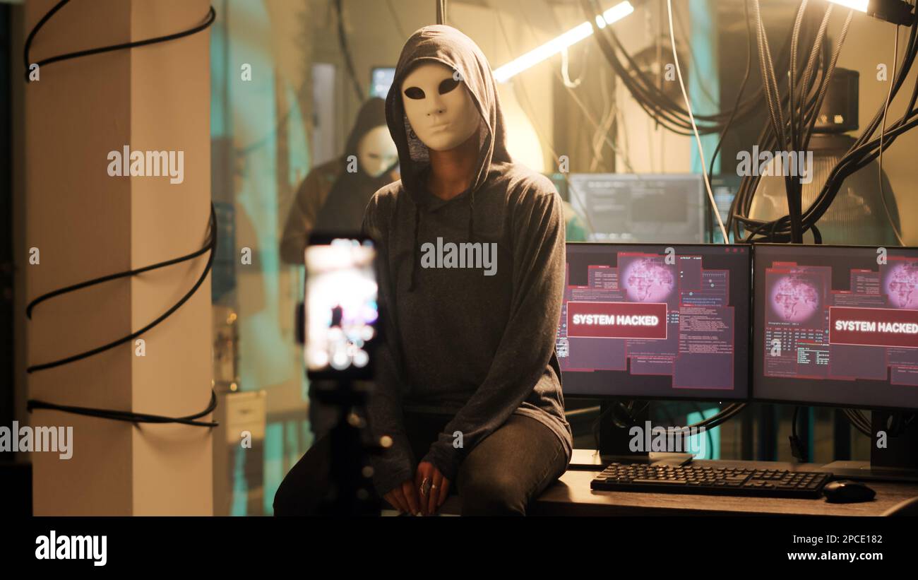 Female thief with mask broadcasting live threat video, asking for ...