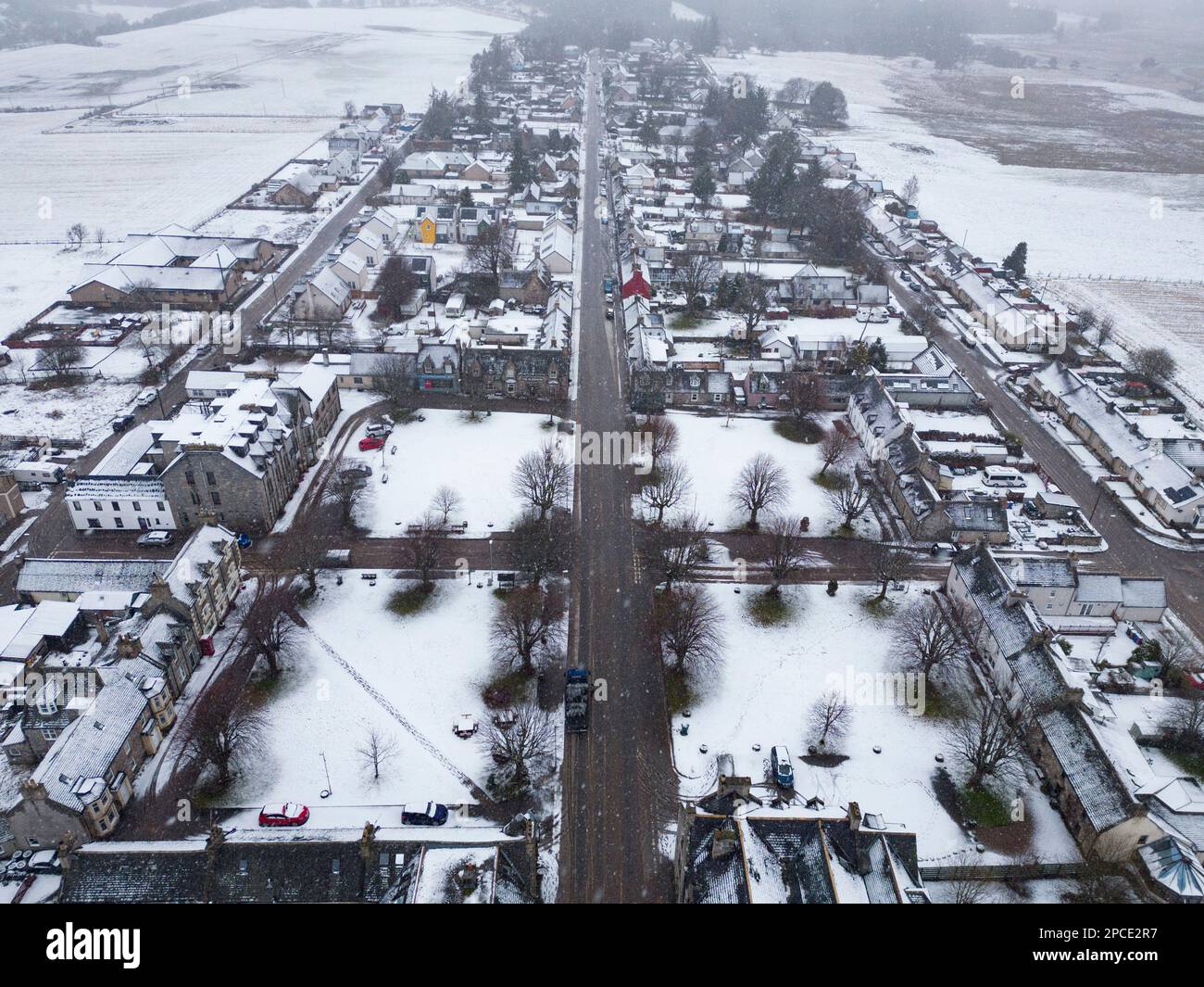 Tomintoul, Moray, Scotland, UK. 13 March 2023. Aerial view of village ...