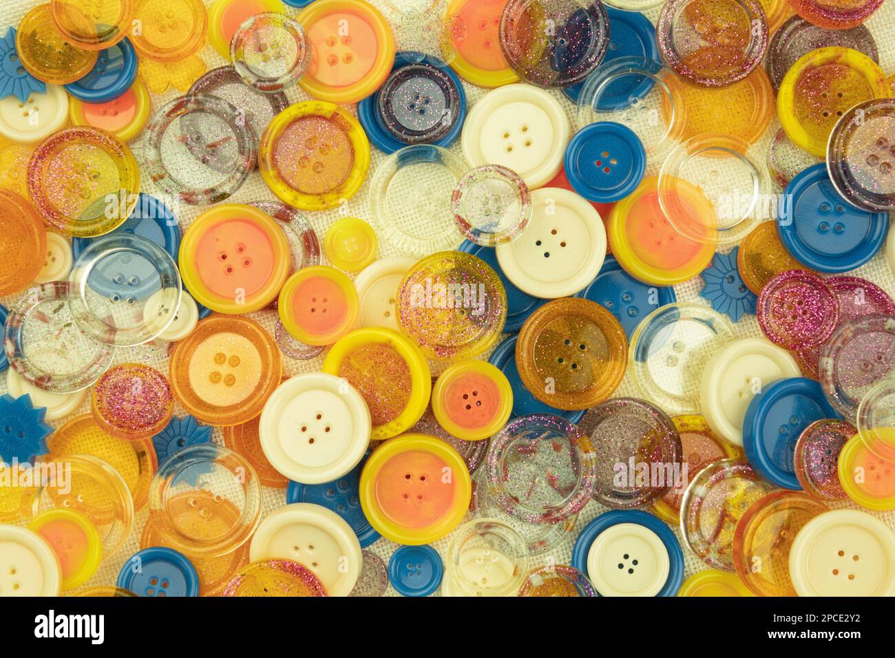 Lots of buttons in different colors and sizes. Colored and bright ...