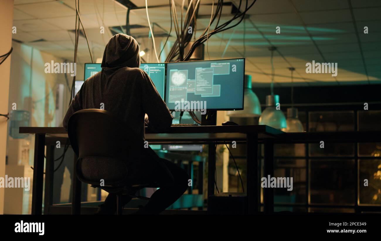 Hacker man trying breach security hi-res stock photography and images ...