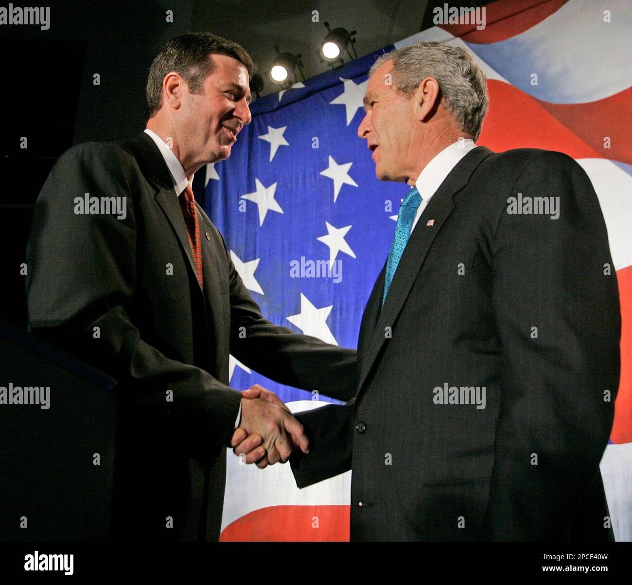 President Bush, right, shakes hands with Sen. George Allen, R-Va ...