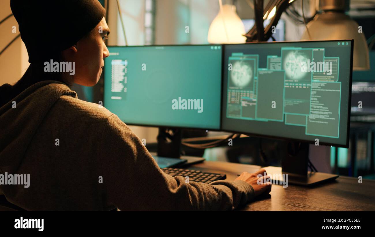 Male thief exploiting server vulnerability and breaking into firewall ...