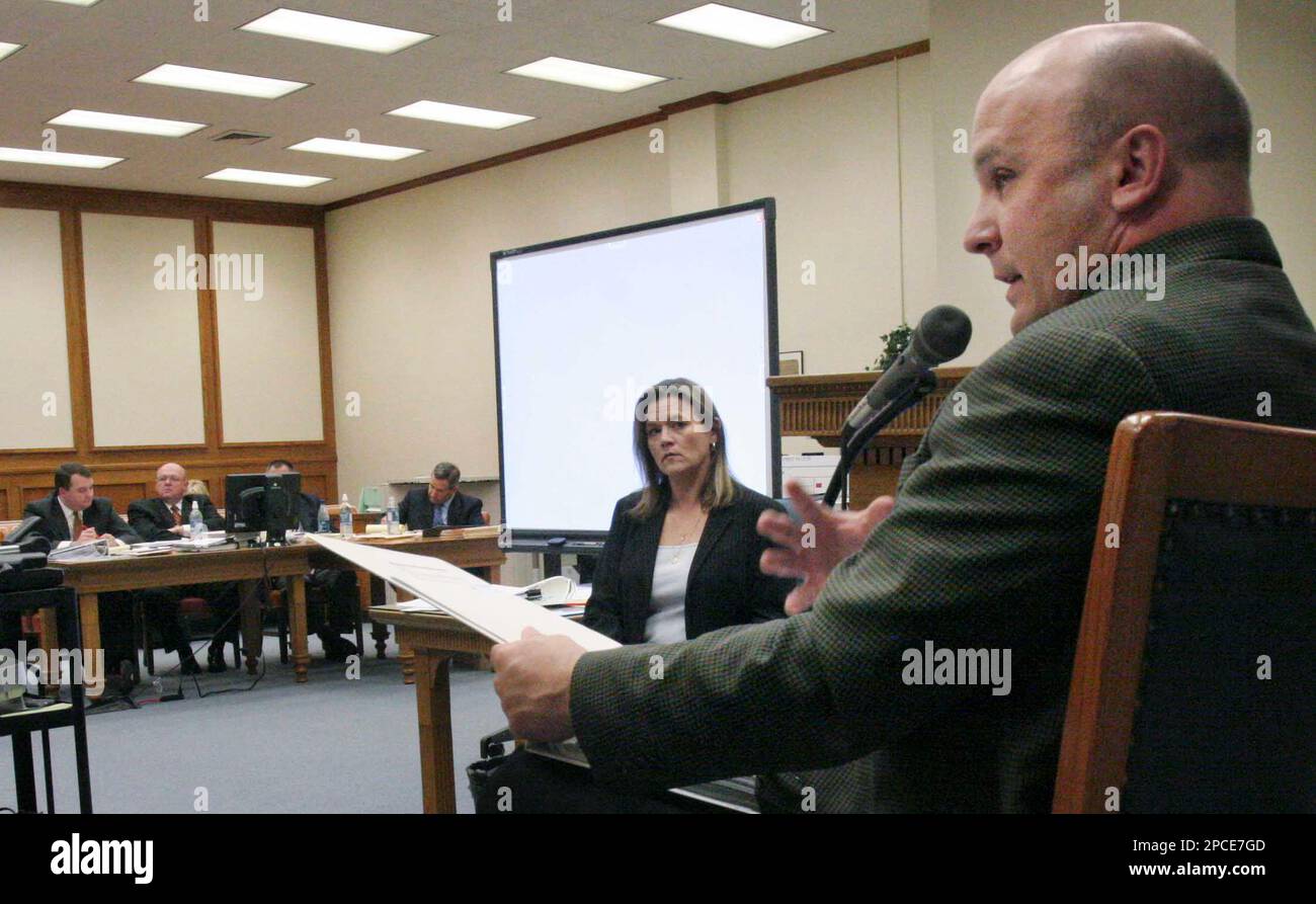 Keith Elliott, left, a former Bureau of Workers' Compensation inspector ...