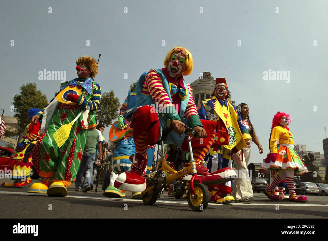 Clowns parade through the streets of Mexico City on Wednesday Oct. 18 ...