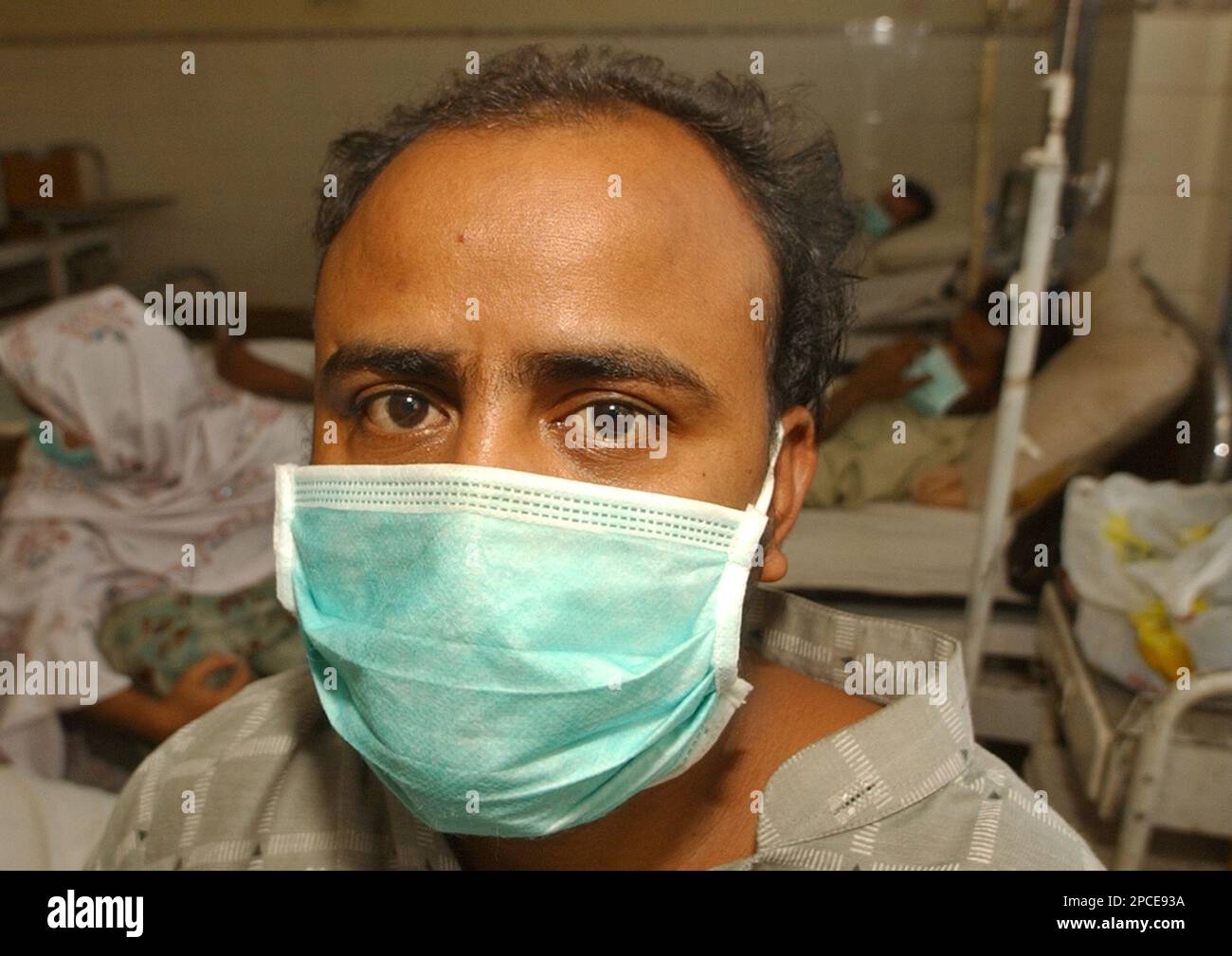 An unidentified Pakistani patient who is suffering from dengue fever is ...