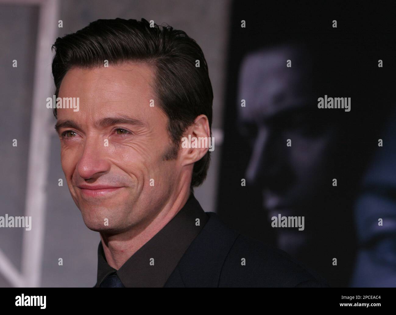 Hugh Jackman poses for photographers at the premiere of "The Prestige ...