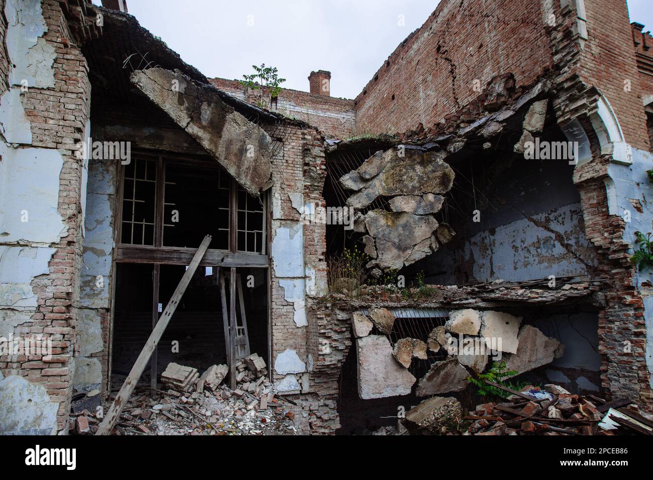 Ruined building destroyed by earthquake, bombing, war, explosion, etc ...